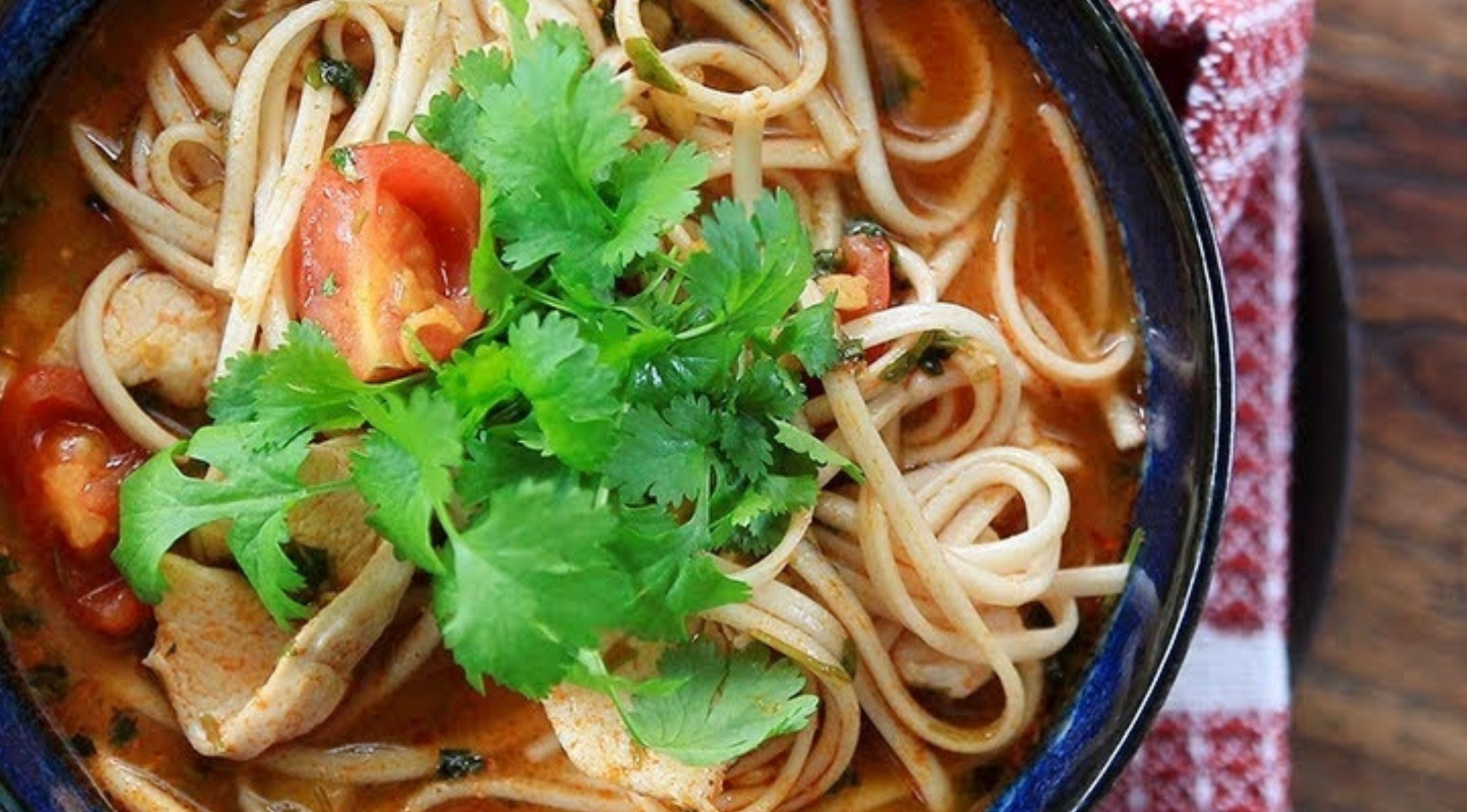 Tom Yam Gai – Thai udon noodle soup with chicken breast and ginger